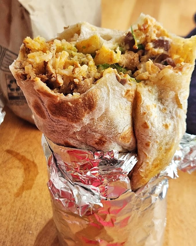 When a burrito stands at attention like this, you know you're in for something special. The cross-section reveals the careful architecture within.