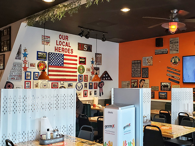 A patriotic corner pays tribute to local heroes. In diners like this, community isn't just a buzzword—it's baked into every square inch.