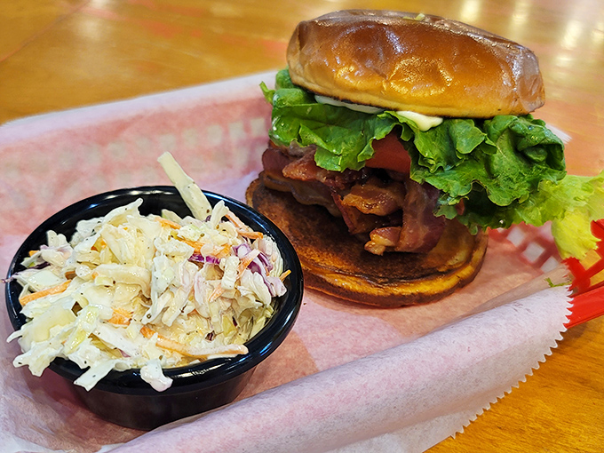 This isn't just a sandwich; it's architecture with bacon. That coleslaw side isn't an afterthought—it's the perfect cool counterpoint to a savory masterpiece.