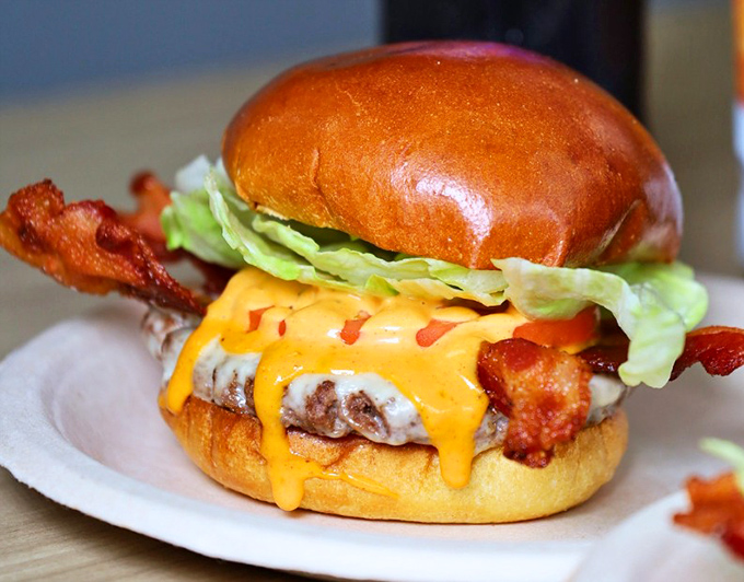This bacon cheeseburger doesn't just speak to you—it serenades you with a ballad of beef, bacon, and melty cheese harmony.