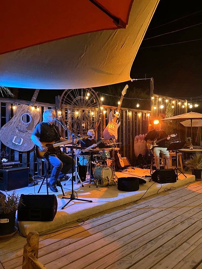 Night falls and the music rises—local bands transform the wooden deck into the most authentic concert venue you'll ever find.