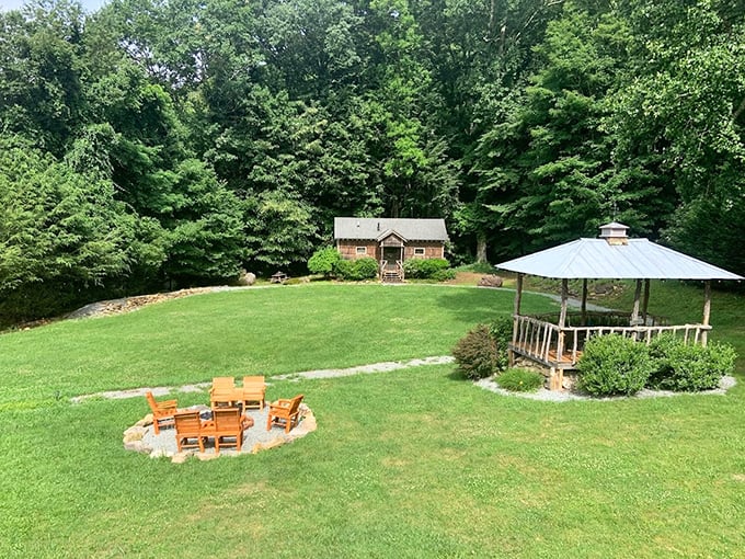 A gazebo and cabin combo that whispers, "Put down your phone and have an actual conversation with someone you like."