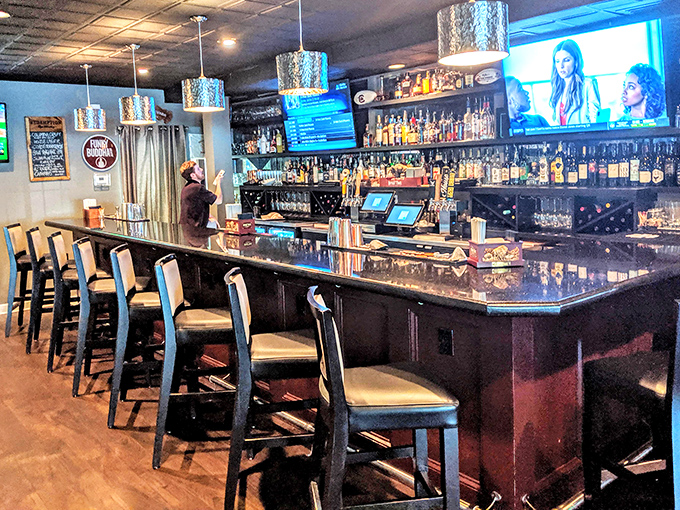 A bar stocked for serious business – where decisions between bourbon and beer are contemplated with appropriate gravity.