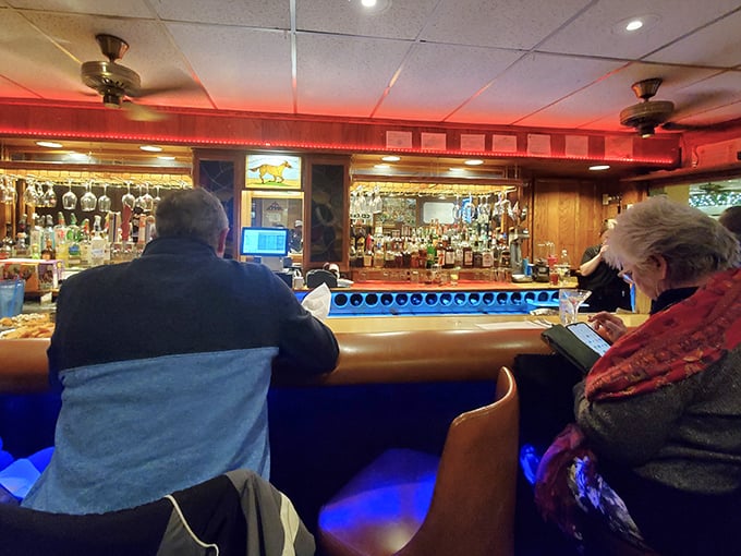 The bar at Hickory Bar-B-Q: where locals gather to debate important matters like Reds vs. Indians and whether sauce belongs on ribs.