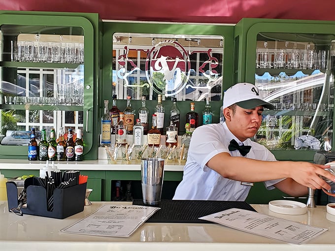 Behind the bar, mixologists craft Cuban classics with the precision of surgeons and the flair of Havana nightclub performers.