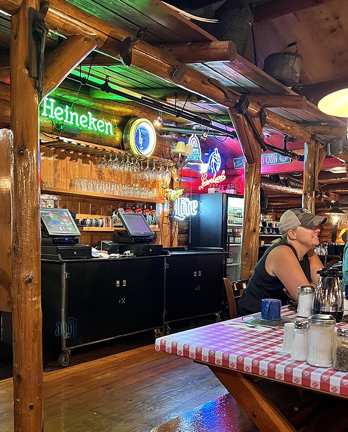 The bar doesn't just serve drinks – it serves conversation, laughter, and the kind of casual camaraderie that makes strangers feel like neighbors.