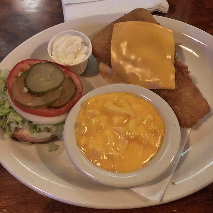 The fish sandwich with mac and cheese—comfort food squared. No pretentious plating, just honest-to-goodness flavor that makes you feel like you're home.