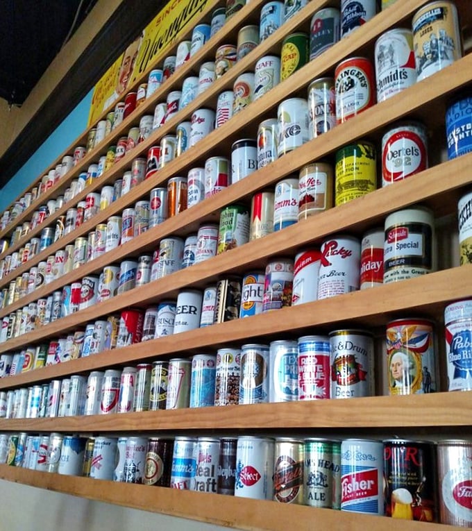 The impressive beer can collection isn't just decoration—it's a timeline of American brewing history displayed with reverence and style.