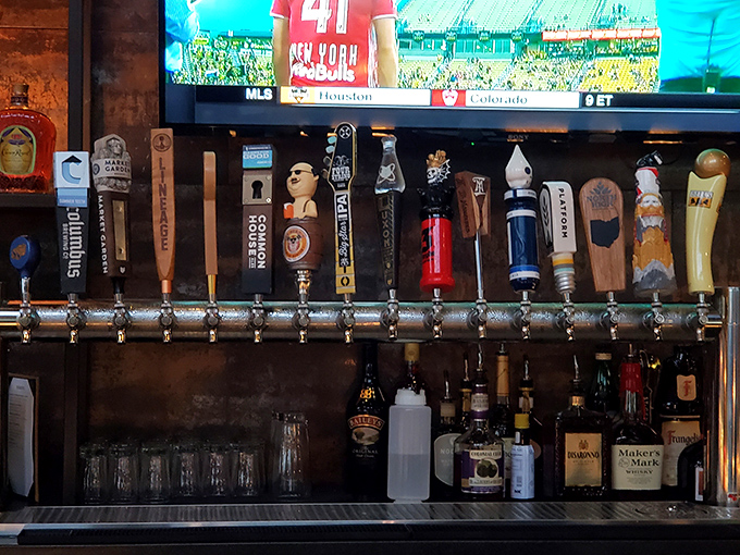 Beer taps lined up like old friends at a reunion, each with a story to tell and a flavor to share.