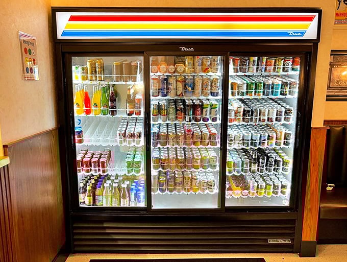 The beverage cooler of dreams—a colorful array of liquid refreshment options standing at attention, awaiting your selection.