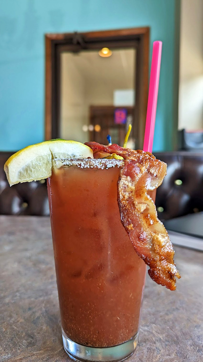 Tom's Bloody Mary—a meal in a glass with bacon as the exclamation point. Sunday morning salvation has arrived.