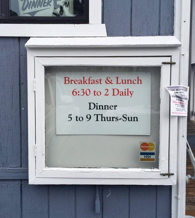 Hours posted like a declaration: "We're here when you need us." Breakfast until 2pm is civilization at its most advanced.