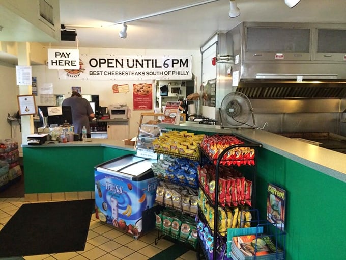The sign proudly proclaims "Best Cheesesteaks South of Philly"—a bold claim they back up with every single order.