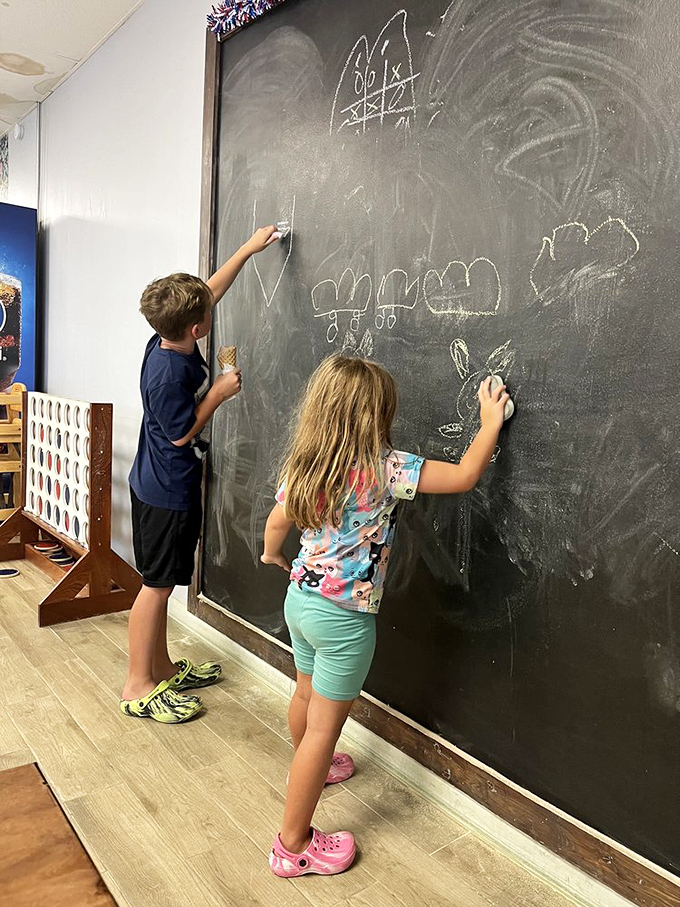 The chalkboard wall – where kids can create while parents indulge. Multitasking has never been sweeter.