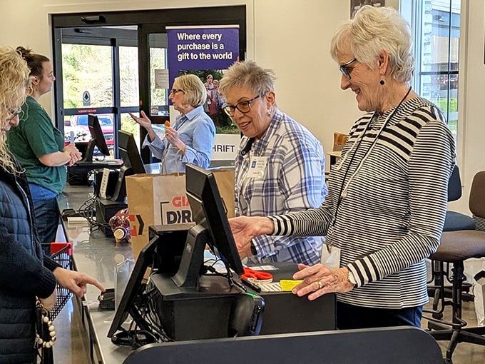 Friendly faces at the checkout, where every purchase becomes a gift that keeps on giving to the community.
