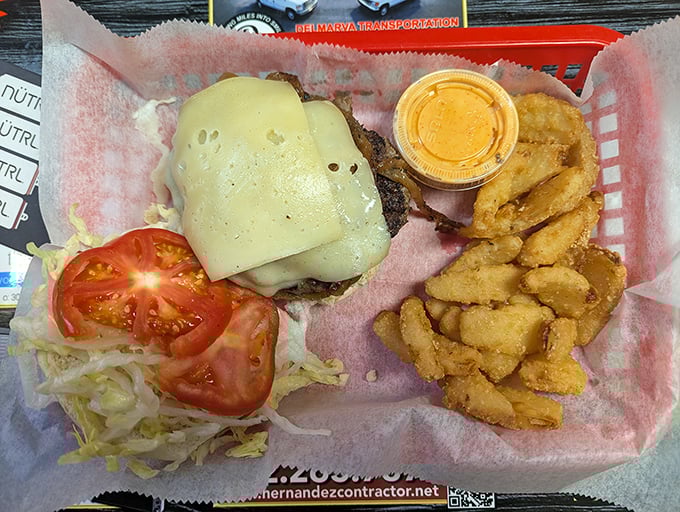 A cheeseburger that doesn't need Instagram filters—just honest beef, melted cheese, fresh toppings, and the kind of fries that disappear mysteriously fast.