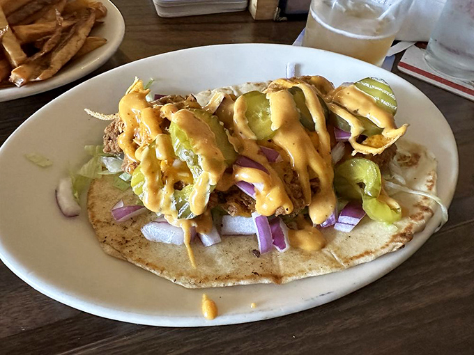 This isn't just a taco—it's a flavor fiesta on a plate, with house-made sauce that should be bottled and sold nationwide.