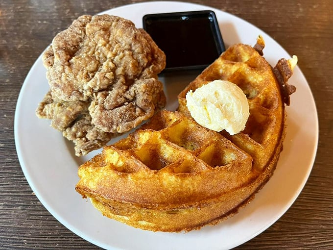 The chicken and waffle situation here isn't just breakfast-meets-dinner—it's a culinary peace treaty where everyone wins, especially your taste buds.