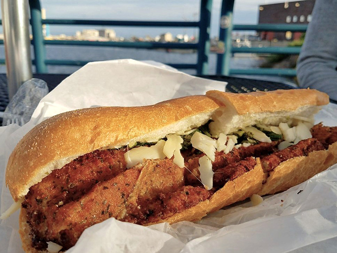 The chicken cutlet sandwich—where breaded perfection meets Italian inspiration. A handheld masterpiece that makes fork users question their life choices.