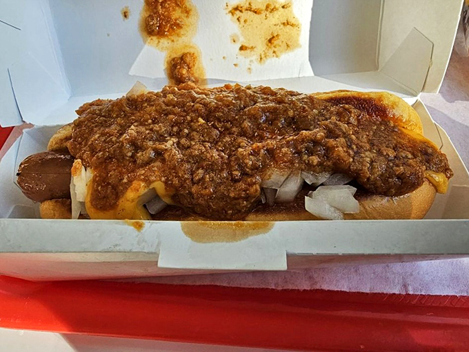 The chili cheese dog—where messy meets magnificent. This handheld masterpiece demands both napkins and your undivided attention.