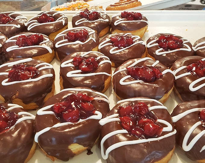 These chocolate cherry creations aren't just donuts—they're proof that someone in this kitchen understands the meaning of true love.