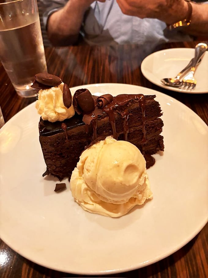 Chocolate cake with ice cream—the dynamic duo that's been ending meals on high notes since childhood, just all grown up now.