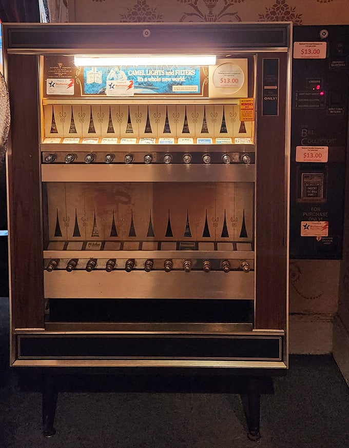 A vintage cigarette machine repurposed as decor – a nostalgic nod to pub culture of yesteryear that adds character to every corner.