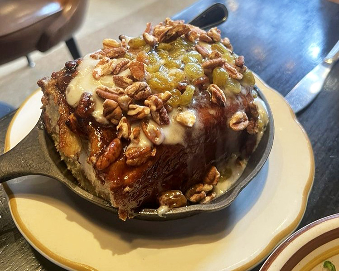 This isn't just a cinnamon roll – it's a spiral-bound dissertation on the power of butter, brown sugar, and perfectly proofed dough.
