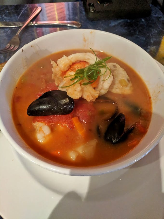 This cioppino is like a United Nations of seafood—mussels, shrimp, and fish holding a delicious summit in tomato-herb broth diplomacy.