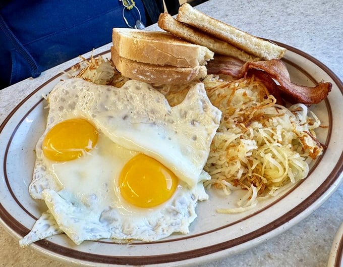 The classic two-eggs-and-sides combo – proof that sometimes the originals never go out of style.
