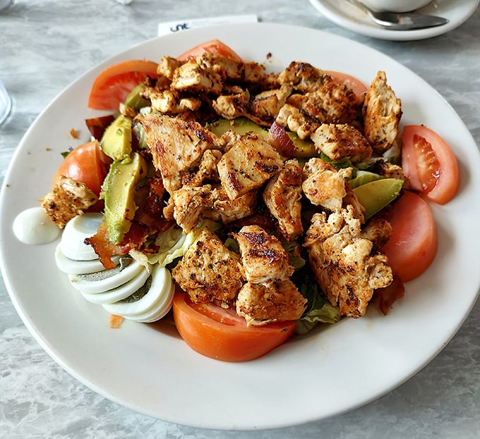 This isn't just a salad; it's protein with purpose. Seasoned chicken chunks nestled among fresh vegetables—a healthy choice that doesn't sacrifice flavor.