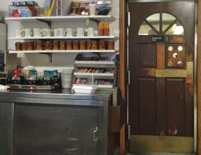 Behind every great diner is an organized chaos of mugs, supplies, and the swinging door that signals food is on its way.