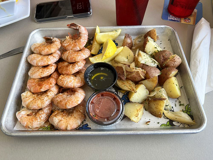 Colossal steamed shrimp that live up to their name, served with potatoes that somehow avoid being upstaged by their seafood costars.