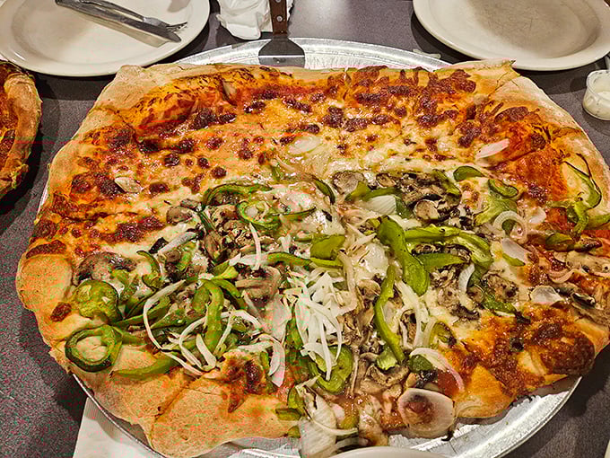 Half plain, half adventurous—the perfect compromise pizza. Those green peppers and onions provide the perfect counterpoint to all that cheese.