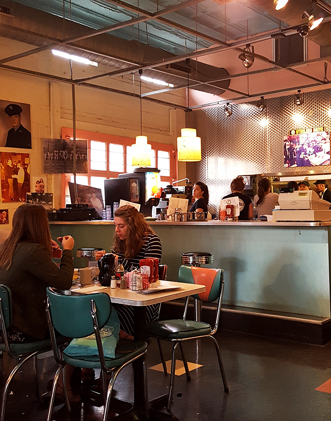 Morning conversations unfold over steaming mugs, proving that some of life's best moments happen in vinyl booths under diner lights.