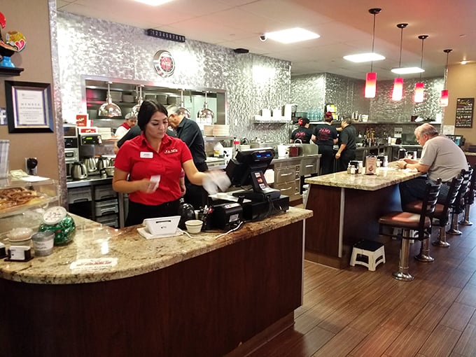 At the counter, efficiency meets hospitality as staff members transform orders into experiences, one plate at a time.