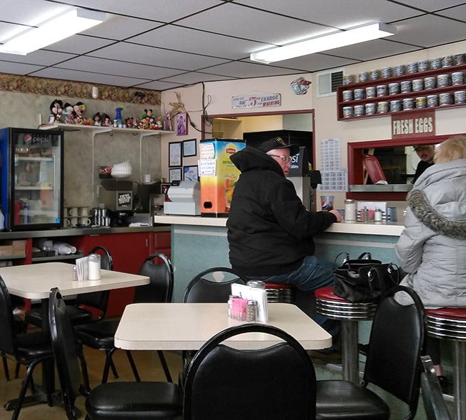 Counter seating—where solo diners become part of the collective experience. The best spot to watch short-order choreography in action.