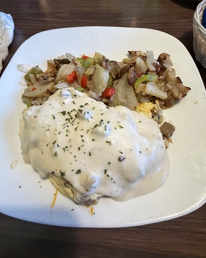 When gravy cascades over an open-faced omelet like this, you don't ask questions—you just grab your fork and give thanks.