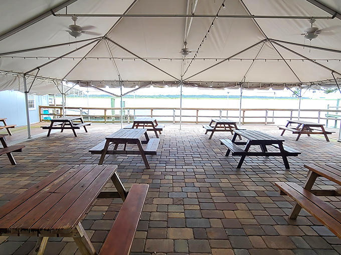 The covered patio offers protection from Florida's occasional liquid sunshine while keeping you connected to those water views.