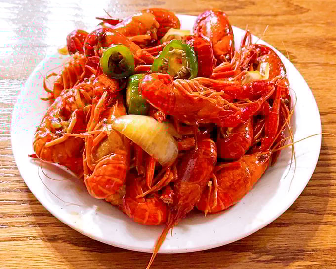 Crawfish with jalapeños—a spicy red pile of Southern charm that demands both napkins and a certain fearlessness of spirit.