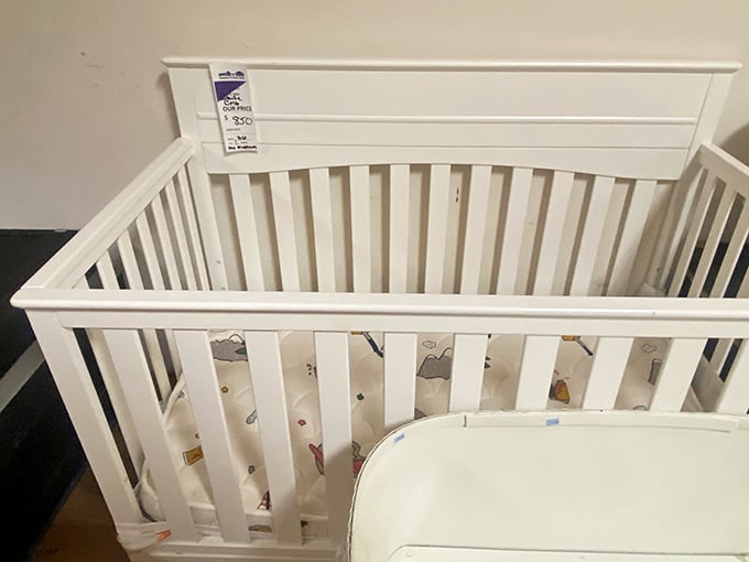 A pristine crib awaits its next tiny occupant. New parenthood is expensive enough – score one for the budget-conscious moms and dads!