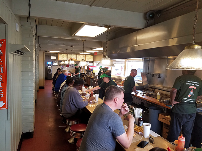 A full counter of satisfied customers tells you everything you need to know. This isn't just eating—it's a communal Delaware experience.