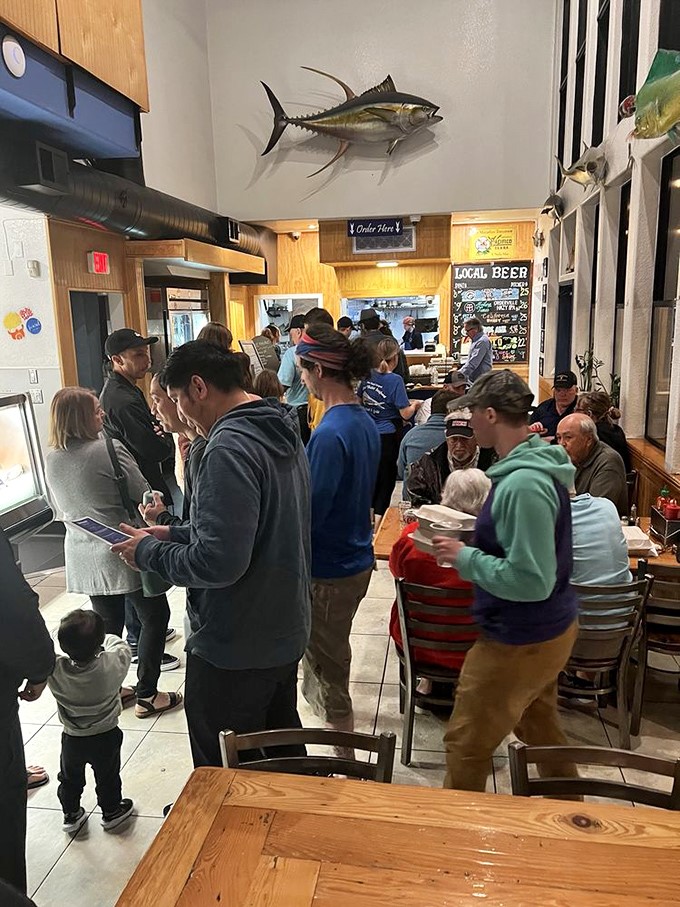 The line forms for good reason. These seafood pilgrims know that patience is rewarded with plates worth writing home about—if your mouth wasn't too busy.