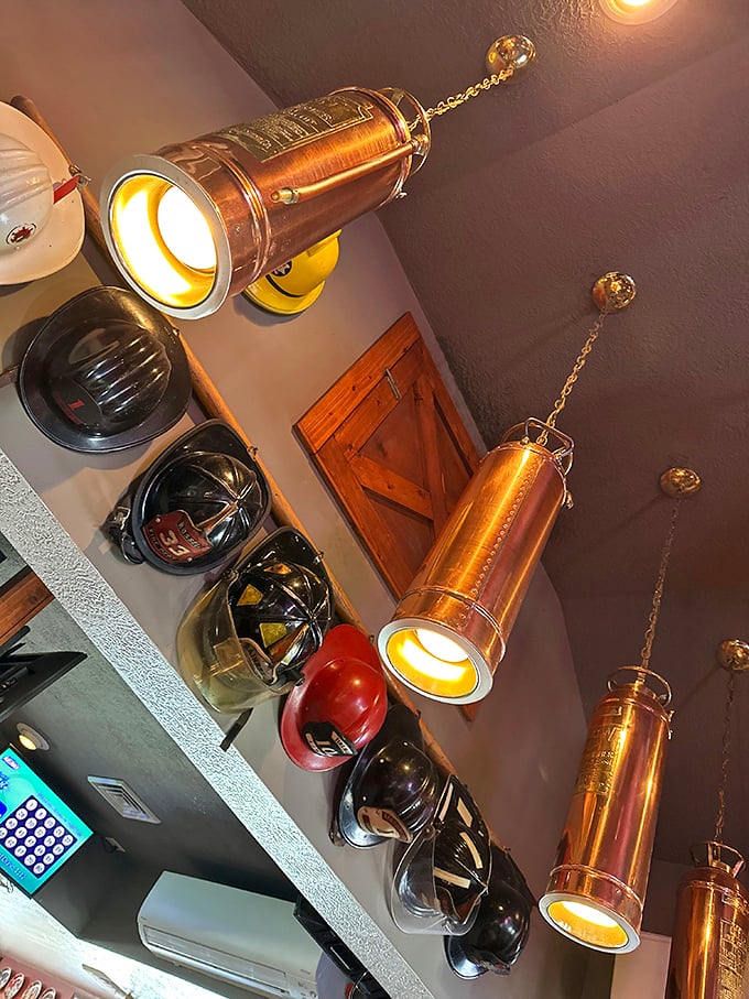 Firefighter helmets and memorabilia aren't just decoration—they're a tribute to the brave and a reminder that good food, like safety, should never be compromised.