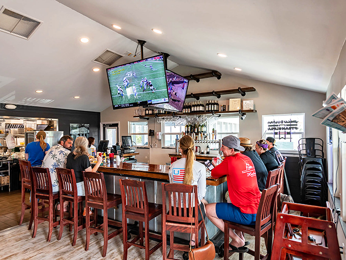 The bar area isn't just serving drinks—it's serving community. Nothing brings people together like cold beverages and the promise of fresh seafood.
