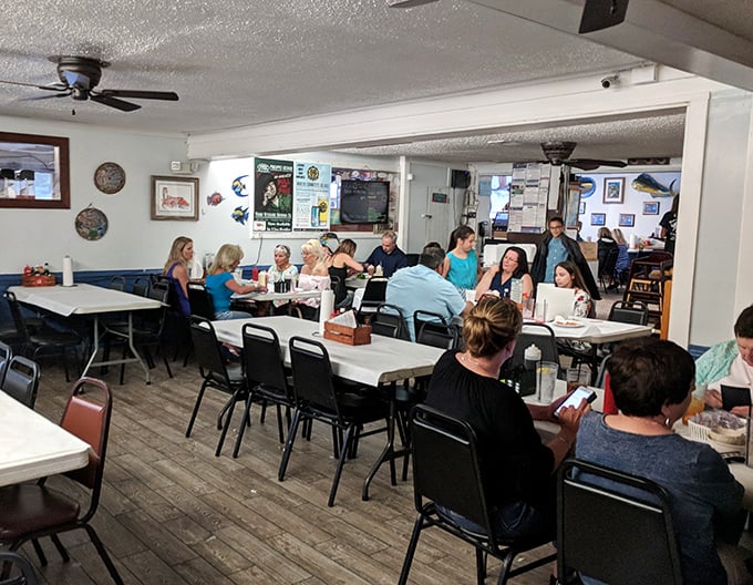 The dining room hums with the universal language of good food – heads nodded in approval between satisfying bites.
