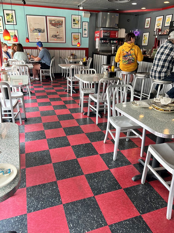 The diner in action—where strangers become neighbors over coffee and conversations that bounce between tables like friendly ping-pong balls.