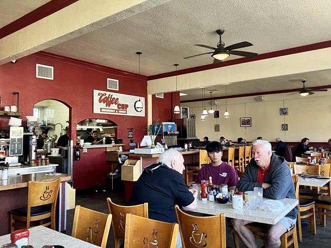 Where coffee cup conversations become neighborhood lore. Locals know this isn't just eating—it's participating in the community's morning ritual.
