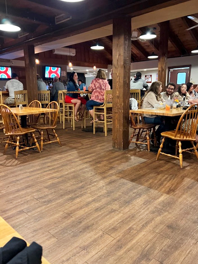 Where wooden beams meet modern conversation, this dining area bridges centuries while keeping the focus where it belongs—on good food and better company.
