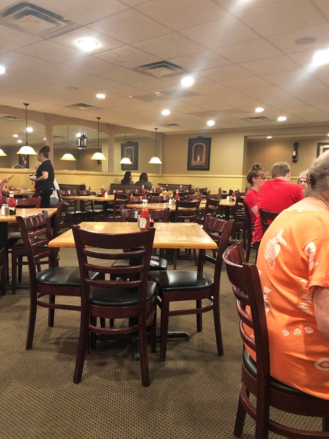 A bustling dining room where families and friends gather for meals that become memories. Notice how nobody's looking at their phones?